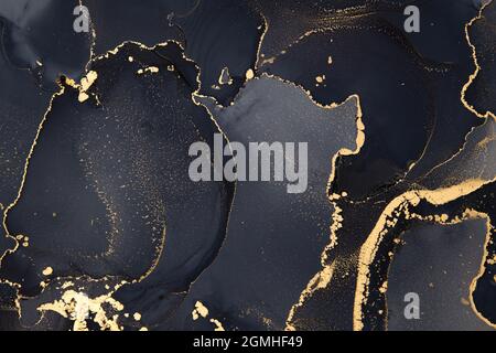 Abstract alcohol ink fluid art background. Green and blue with gold on ...