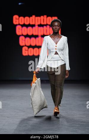 A model walks the runway at the Goodption fashion show during the ...
