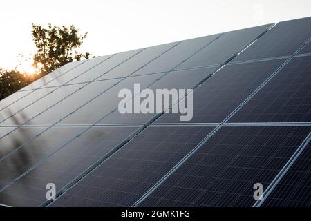 The concept of collecting eco energy from solar panels Stock Photo - Alamy