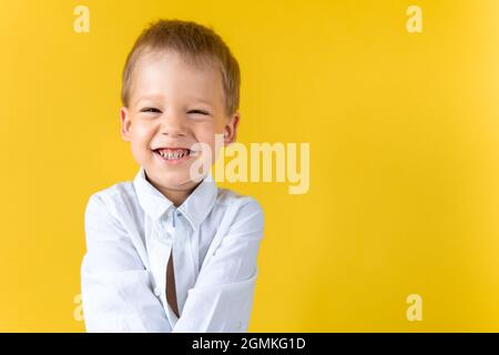 Boy in unbuttoned shirt Stock Photo - Alamy