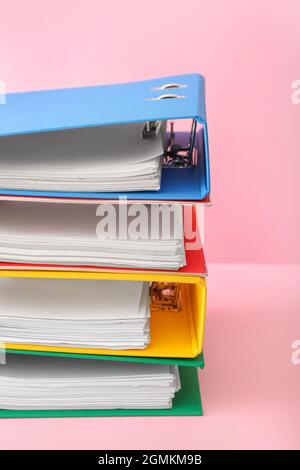 Office folders on color background Stock Photo - Alamy