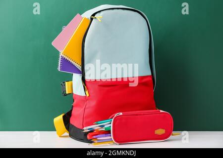 Stylish school backpack with pencil case and different stationery ...