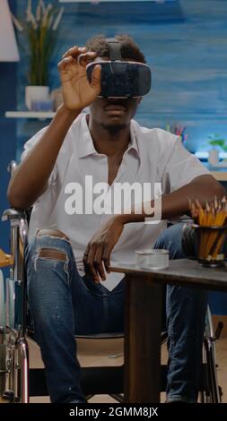 Disabled man with virtual glasses Stock Photo - Alamy