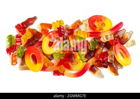Colourful gummy sweets scattered on a glass surface Stock Photo - Alamy