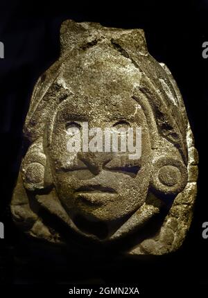 MEXICO CITY: Stone statue of Xochipilli, god of art, games, beauty ...