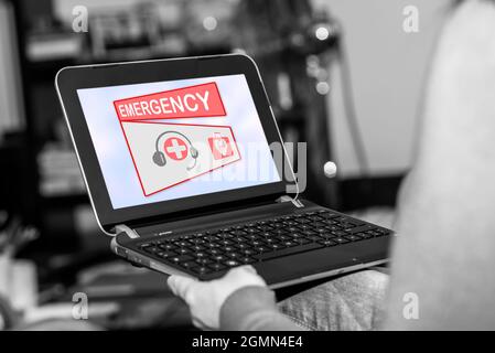 Tablet screen displaying an emergency concept Stock Photo - Alamy