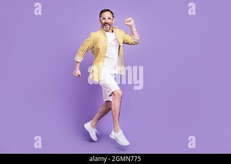 Photo of pretty funky mature man dressed yellow shirt smiling pointing ...