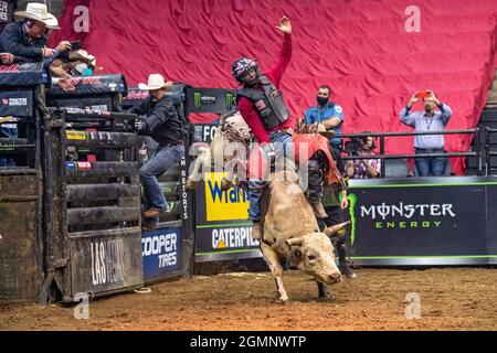 Ramon de Lima rides Dang It during the Professional Bull Riders 2021 ...