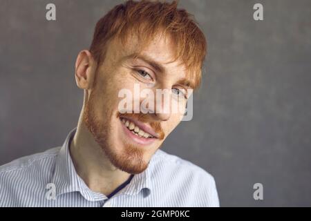 Headshot of happy redhead man with beard and white teeth, smiling ...