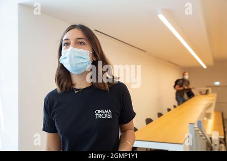 A girl volunteer of Piccolo America Association in the hall of Troisi ...