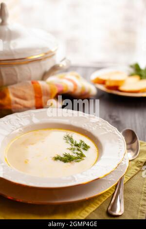Creamy fish soup with salmon, potatoes, onions , carrots, dill and ...