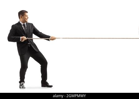 Business people pulling rope in office, funny teambuilding activity ...