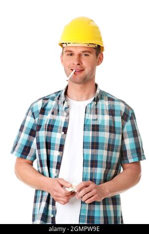 builder smoking cigarette on construction site Stock Photo - Alamy