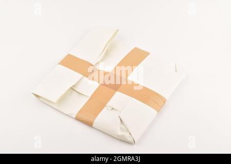 Taped packet isolated on white background, secure parcel Stock Photo ...