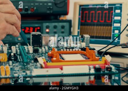Repair of computer parts in a customer service laboratory Stock Photo ...