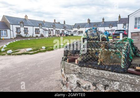Coastal village of Low Newton-by-the-Sea with pub the Ship Inn in the ...