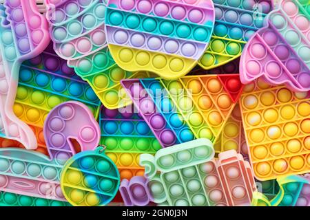 Colorful Antistress Pop it toy. Rainbow sensory fidget isolated on ...