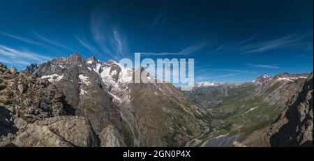 Aerial view of La Meije mountain covered with snow in Alps, France ...