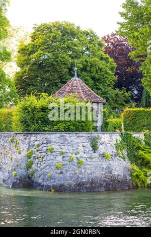 Beautiful view of a wall, lake, hedges in the park Stock Photo - Alamy