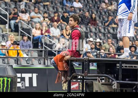 Ramon de Lima rides Dang It during the Professional Bull Riders 2021 ...