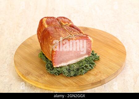 Delicous pork cured meat isolated over board Stock Photo - Alamy