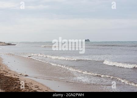 Storm sea sand beach is a neutral color. Natural background in beige ...