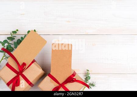 empty xmas wish list with little gift on wooden background Stock Photo ...