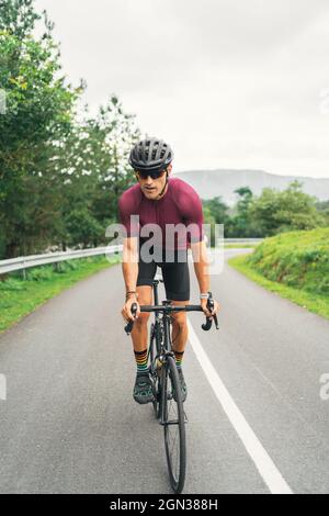 Bicyclist on a Bike Lane against Hungarian parliament building Stock ...