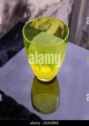 Colored transparent green glass cup for water drinking and surface ...