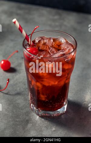 Cold Refreshing Cherry Cola with Ice in a Glass Stock Photo - Alamy