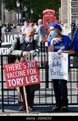Pro and Anti- Brexit Protesters face off on opposite sides of the road ...