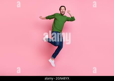 Photo of crazy overjoyed person look arms hold giftbox toothy smile ...