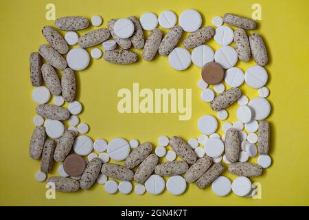 frame from assorted pills, textured background Stock Photo - Alamy
