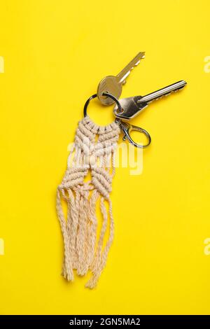 Keys with handmade cotton keychain on white background Stock Photo - Alamy