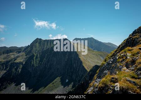 mountains over clear blue sky Stock Photo - Alamy