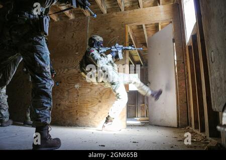 A British Royal Marine with 43 Commando Fleet Protection Group Royal ...