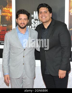 L-R: John Magaro and Samson Moeakiola attend the premiere of The Many ...