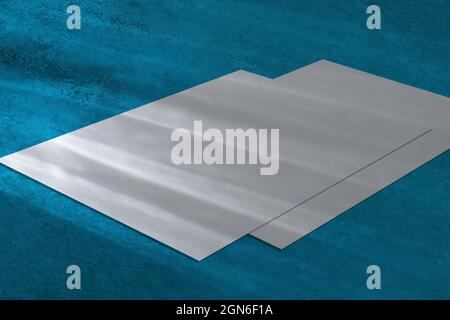 Two empty horizontal rectangle poster mockup on mint blue background ...