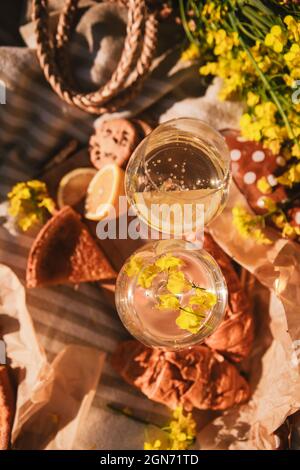 picnic concept glasses of wine bun outdoors on blanket summertime Stock ...
