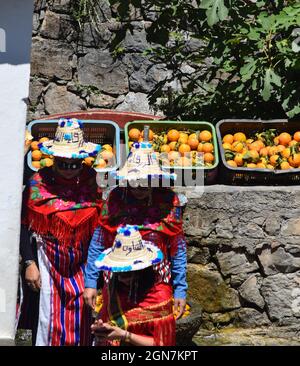 Moroccan women wearing traditional clothes in Chefchaouen, Morocco ...