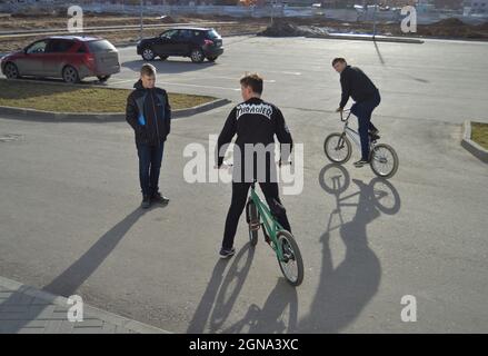 Kovrov, Russia. 9 April 2017. Teens who ride on BMX bikes near the shopping center Rus Stock ...