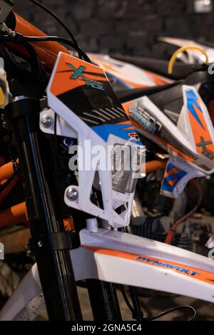 VINNYTSIA, UKRAINE - Jun 17, 2021: A display of the new colorful dirt bikes in the store Stock ...
