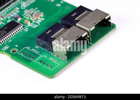 Disk array controller card( Raid ) with with double mini sas connector isolate on a white ...