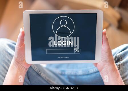 Tablet screen displaying a login concept Stock Photo - Alamy
