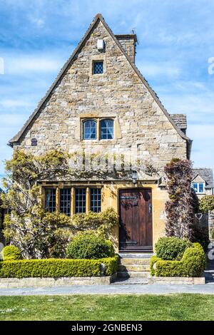 A door and window of a cotswold limestone house in Blockley, the ...
