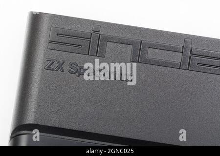 Close shot of raised Sinclair ZX Spectrum logo on black casing. Vintage ...