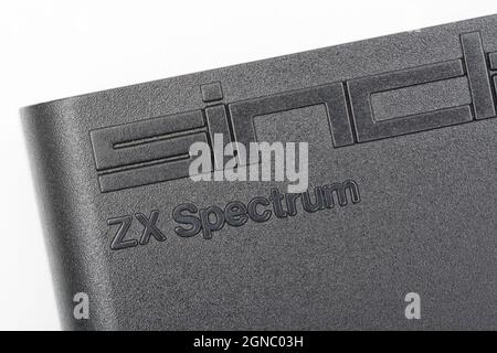 Close shot of raised Sinclair ZX Spectrum logo on black casing. Vintage ...