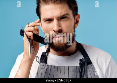 bearded man beauty saloon blue background Stock Photo - Alamy