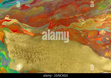 Gold spots on red smudges of paint. Abstract pattern Stock Photo - Alamy