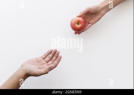 Poverty concept. Dirty hands giving bread isolated on balck background ...